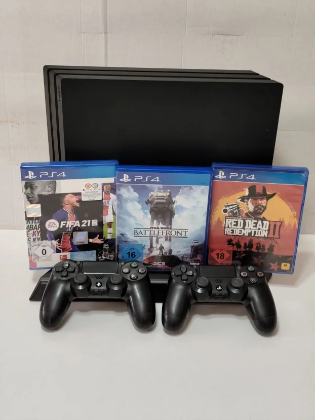 PS4 Pro 1TB + Punjač USB Kuler+2 Džoja +9 Igre HDD+3 Igre CD ...