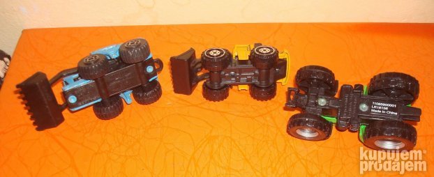 Polovni zeleni traktor, utovarivač plavi i žuti grad auto p ...